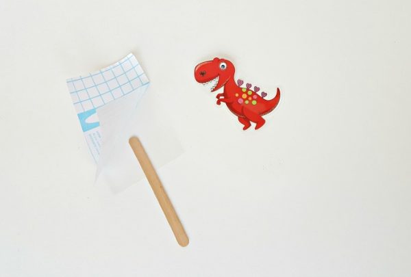 Make your own craft stick dinosaur puppets - My Bored Toddler