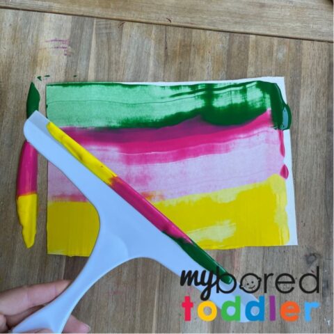 Squeegee Painting - My Bored Toddler end result is a mystery!