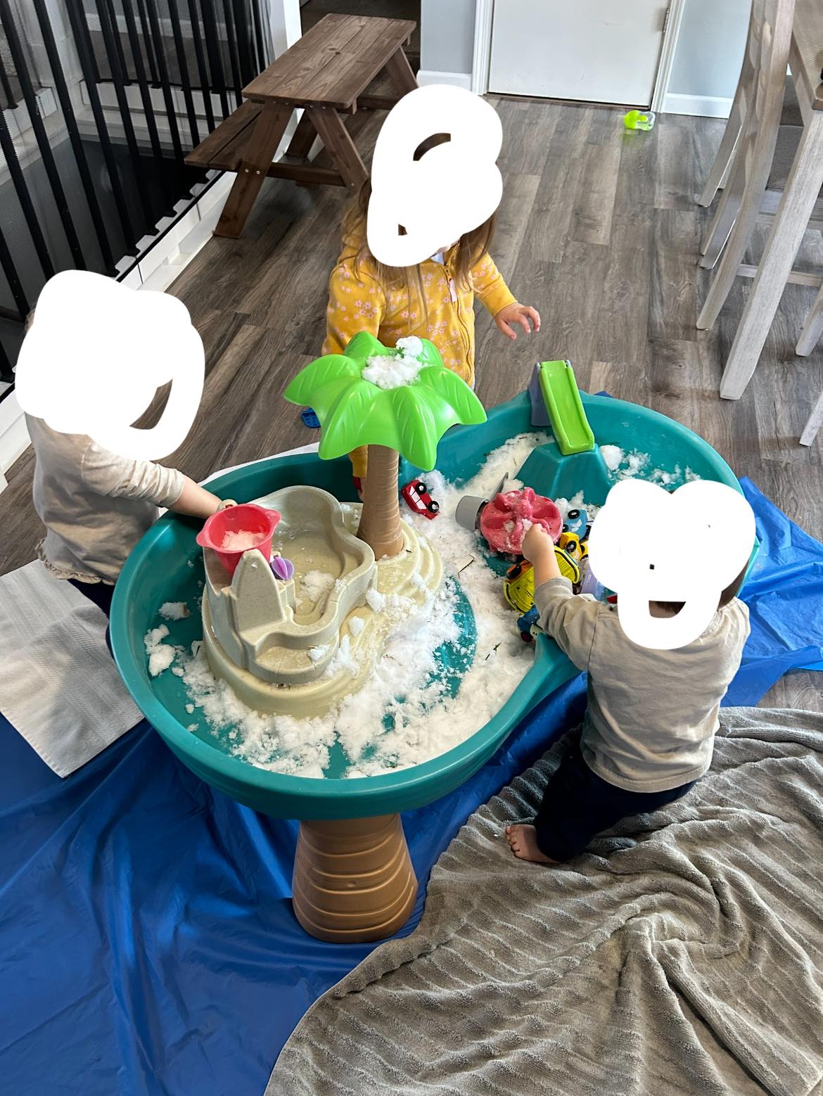 Snow in a water table with cars cups and measuring devices - shared by ...