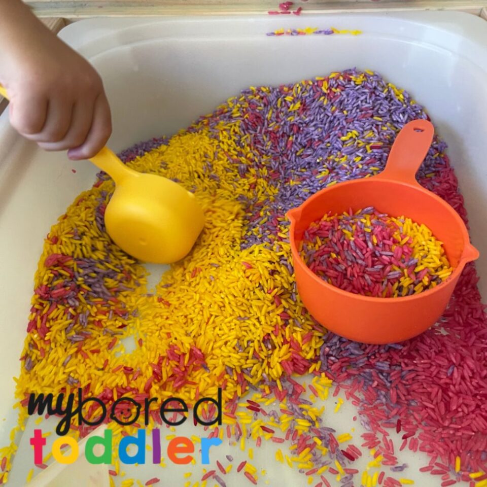 Coloured Rice Pouring Station - My Bored Toddler Fun and Easy Setup!