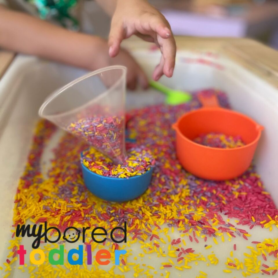 Coloured Rice Pouring Station - My Bored Toddler Fun and Easy Setup!